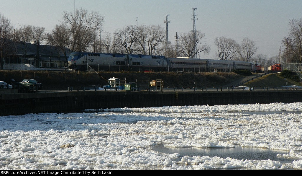 AMTK 350 with an icy Trail Creek with South Shore looking on
